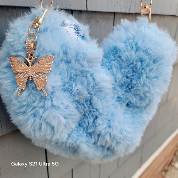 Bags | Fluffy Blue Handbag With Gold Butterfly Charm | Poshmark